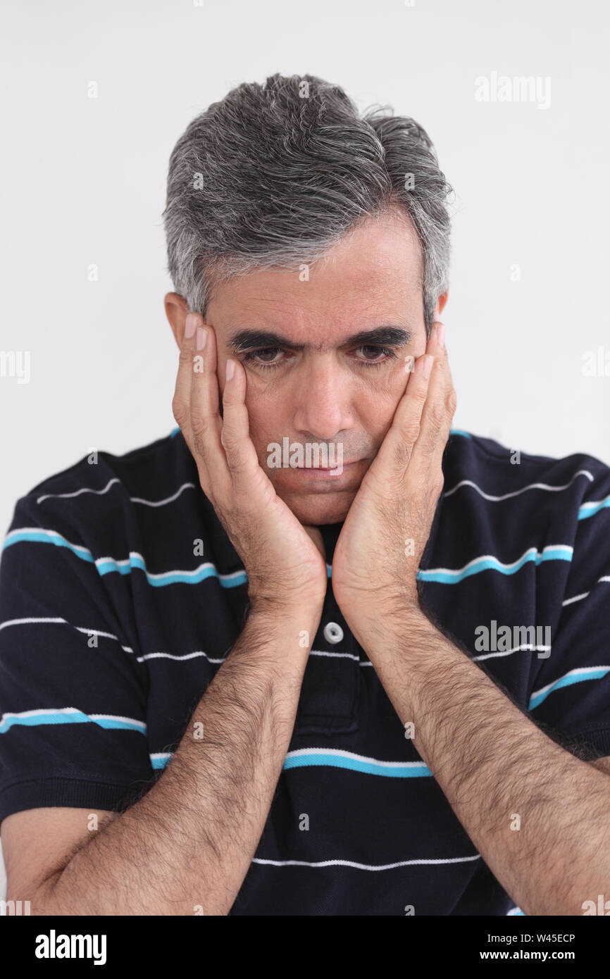 Man looking depressed Stock Photo - Alamy