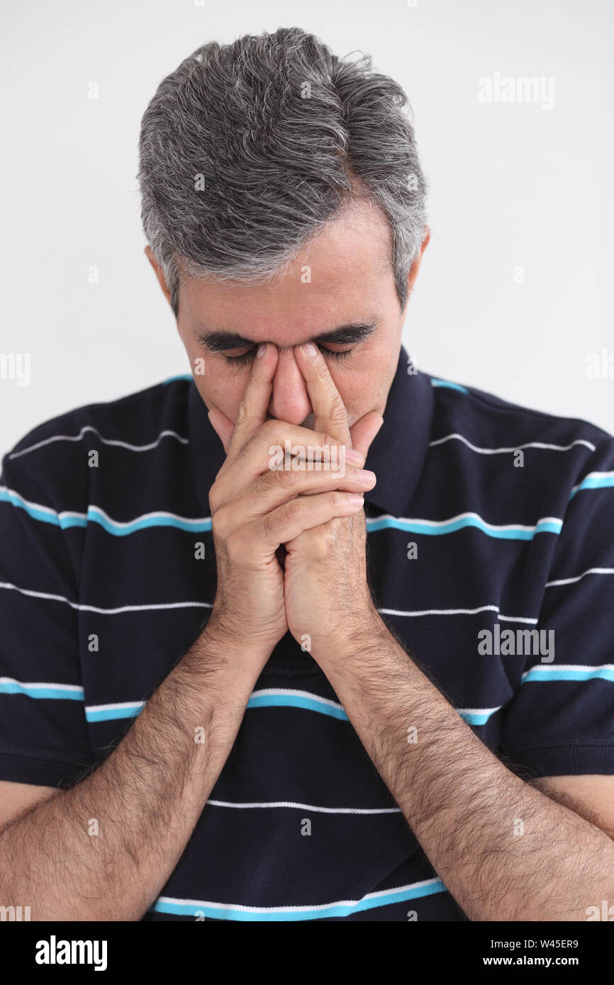Man looking depressed Stock Photo - Alamy