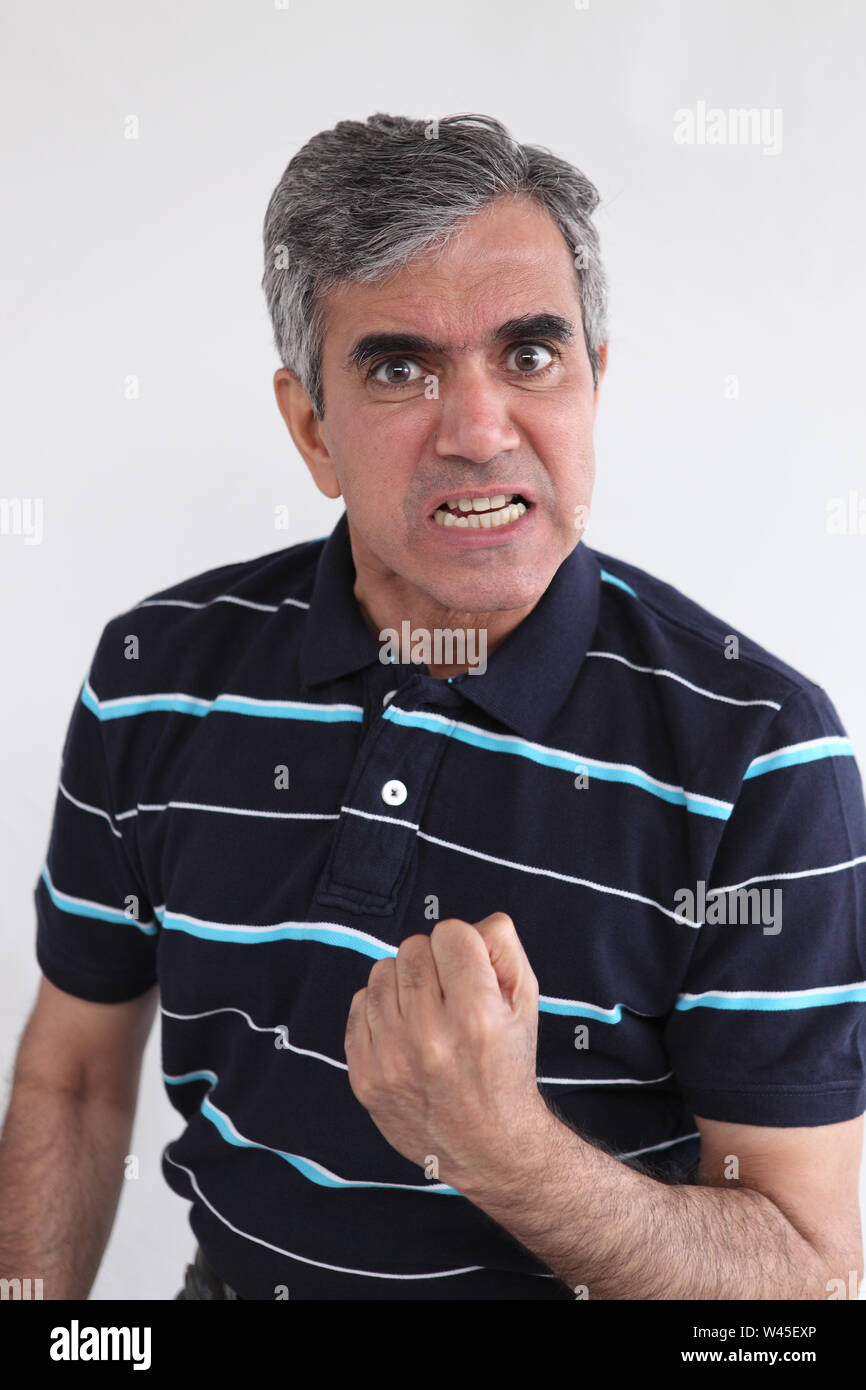 Portrait of a man looking frustrated Stock Photo - Alamy