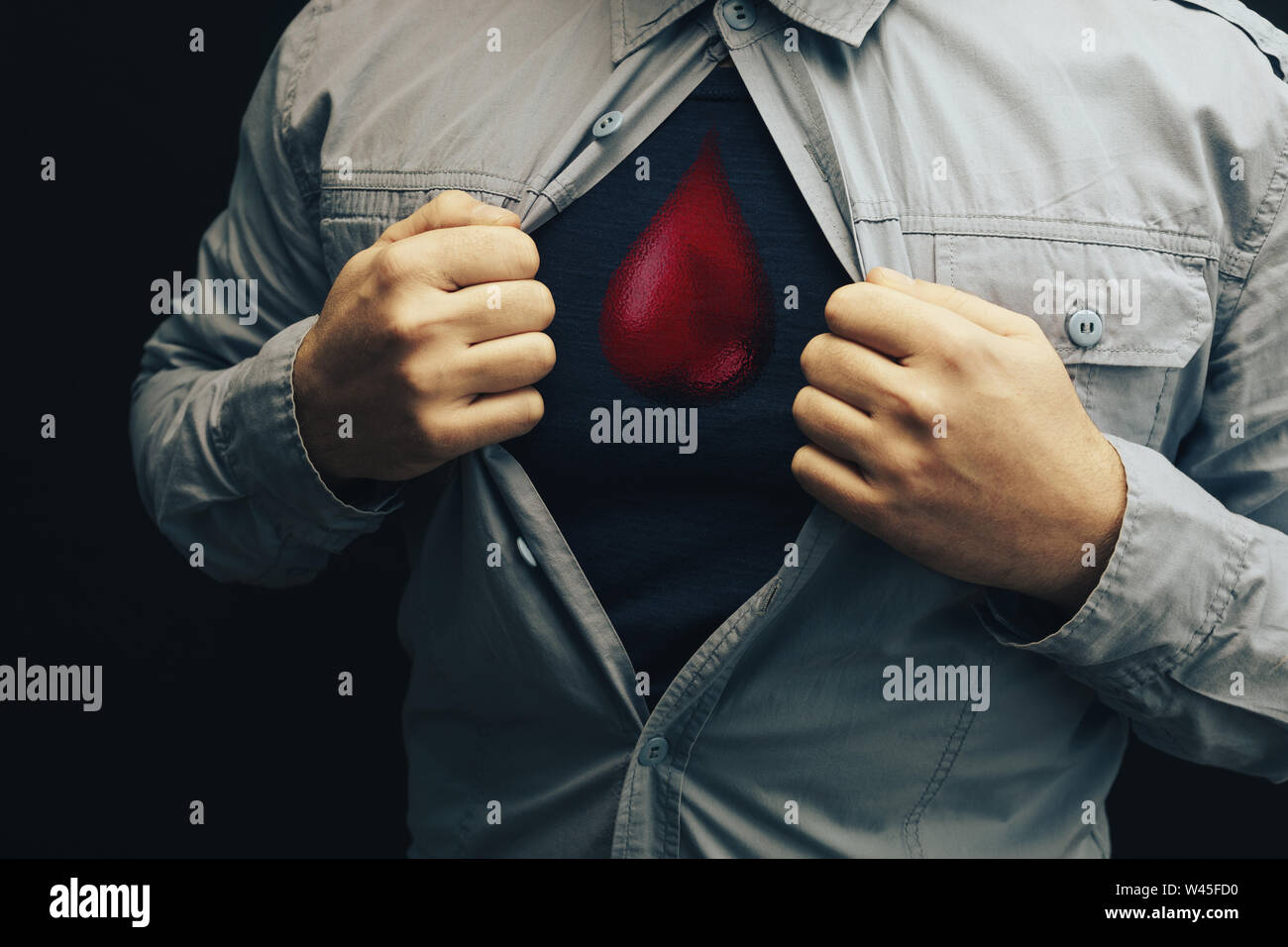 Business man in shirt with a picture red blood drop. World Blood Donor ...