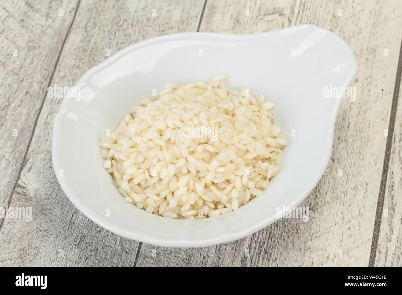 Raw Arborio rice for Italian risotto Stock Photo - Alamy