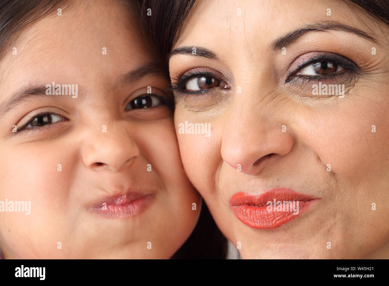 Mother and daughter making faces Stock Photo - Alamy