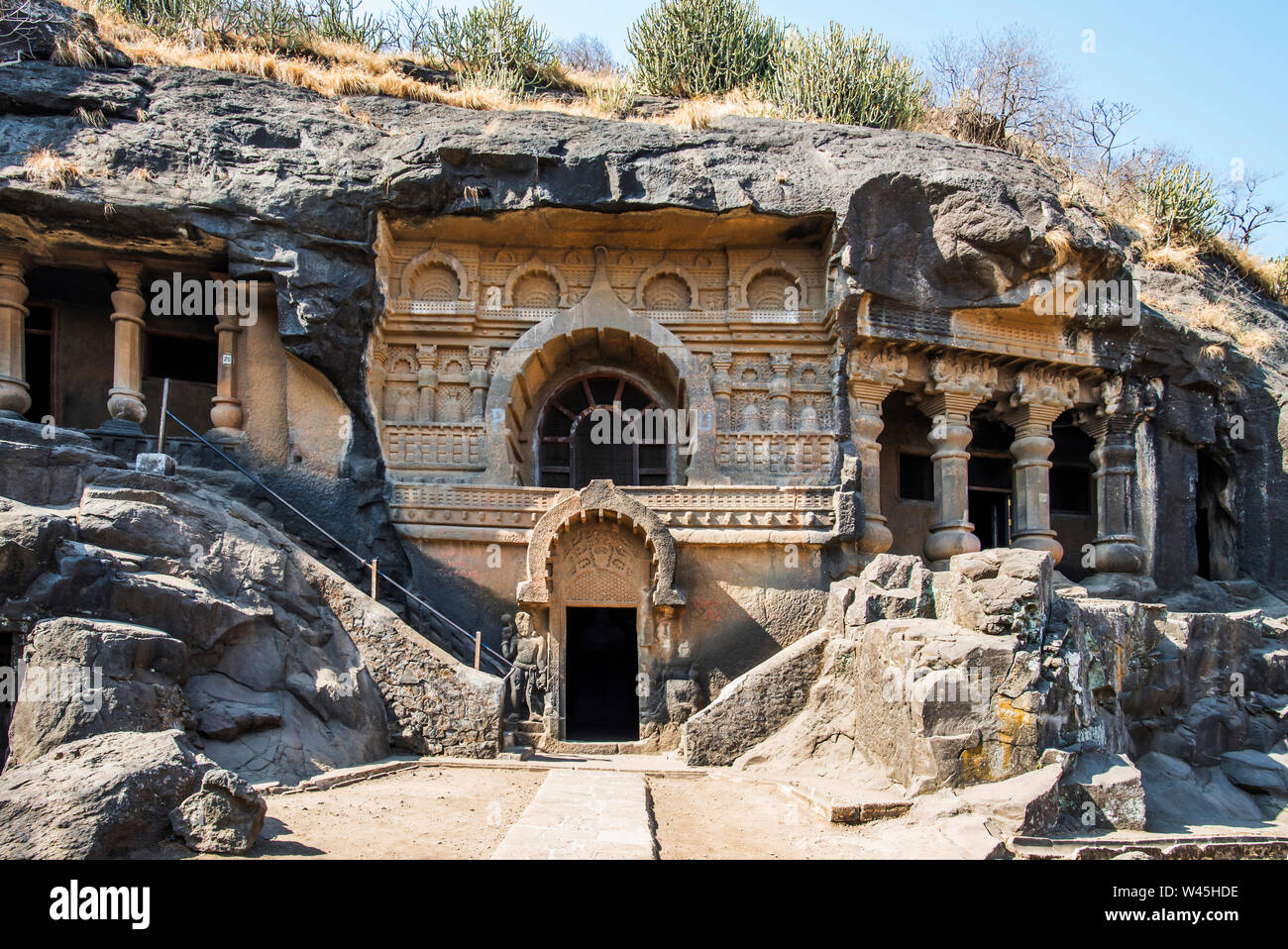 Cave 17 18 And 19 General View Of Facade Nasik Maharashtra Stock cave-17-18-and-19-general-view-of-facade-nasik-maharashtra-stock