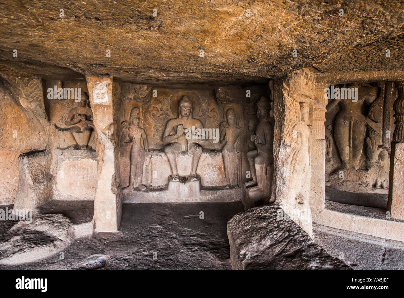 Cave 23, A small Buddha shrine with chourior flywhisk bearers on either ...