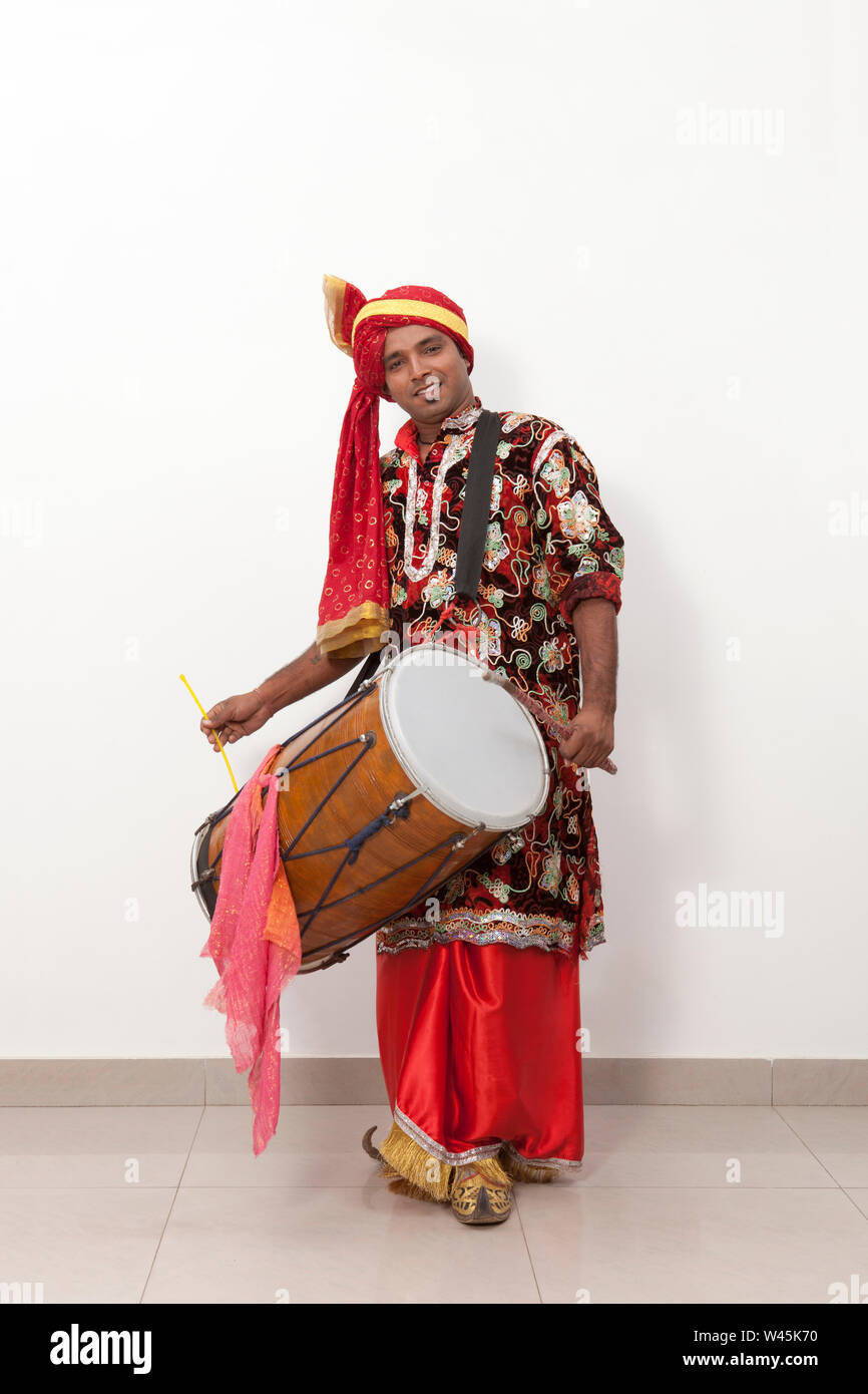 Man playing a drum Stock Photo - Alamy