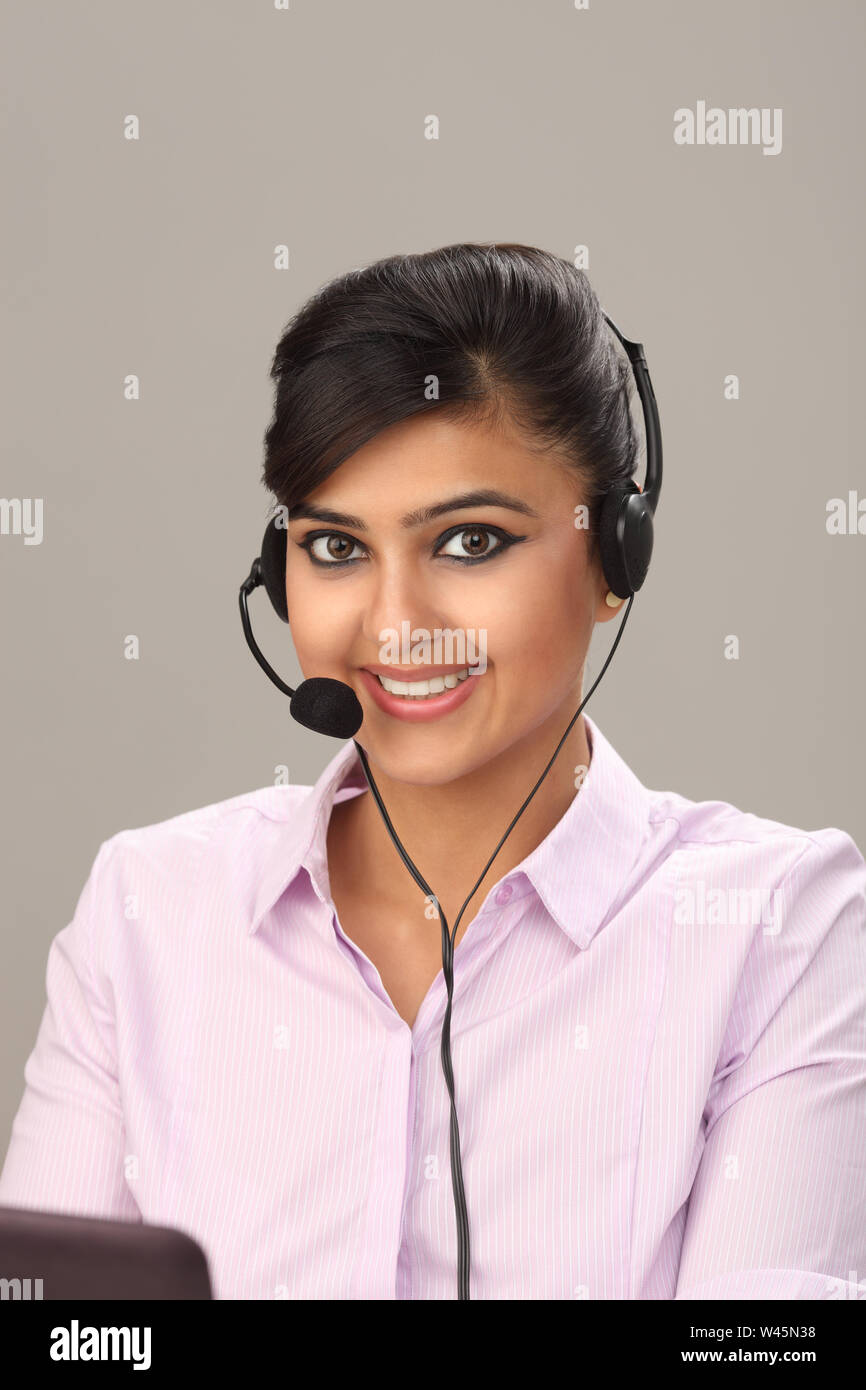 woman wearing headset Stock Photo - Alamy