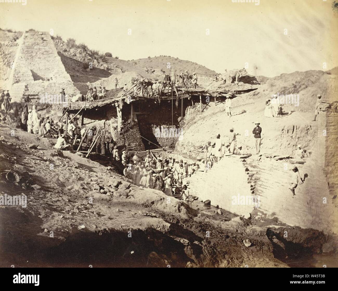 Construction of the Bheer Dam in progress in 1872 (3 Stock Photo - Alamy