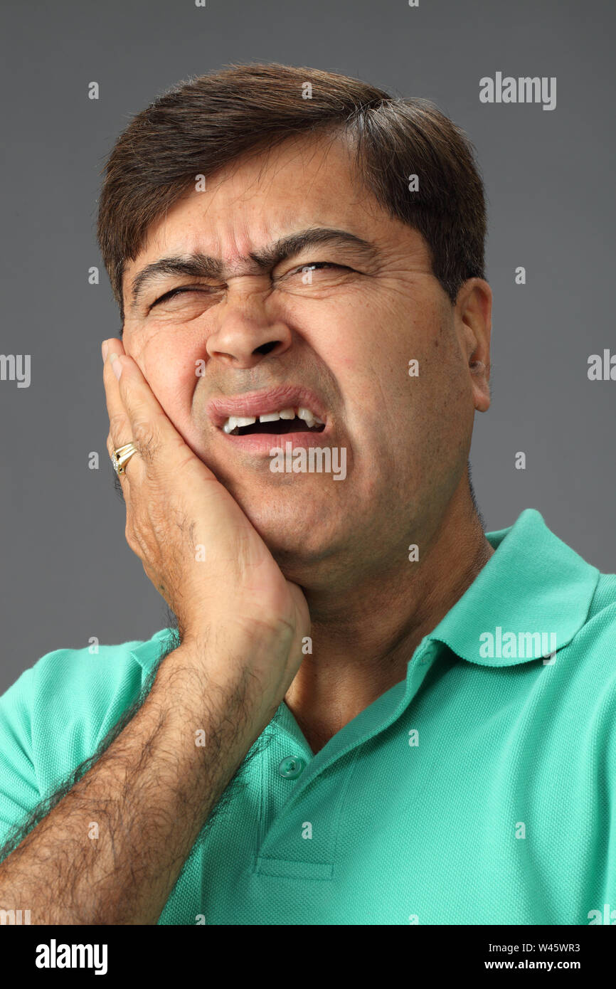 Man suffering from toothache Stock Photo - Alamy