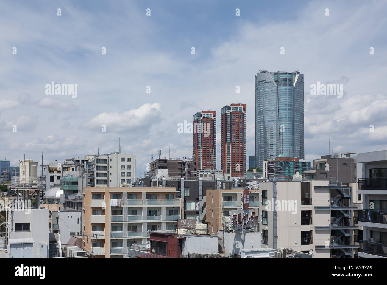 Roppongi Hills tower seen over urban sprawl in Azabu Juban, Tokyo, Japan Stock Photo - Alamy