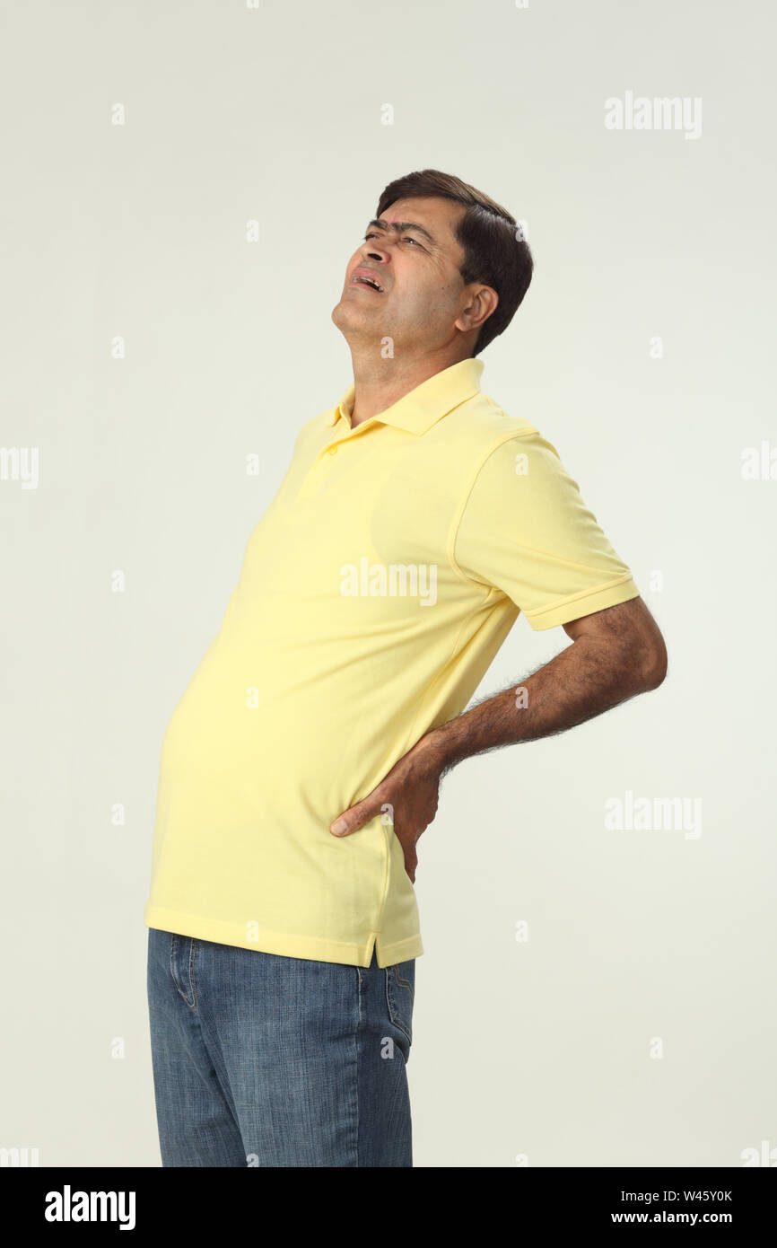 Indian man backache pain illness hi-res stock photography and images ...