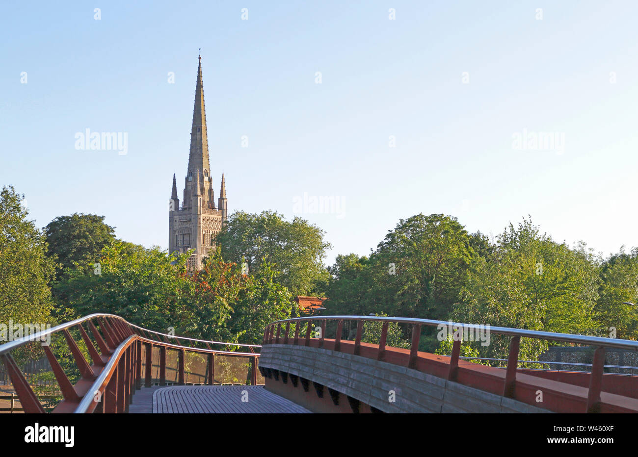The Norman tower and 15th century spire of Norwich Cathedral viewed ...