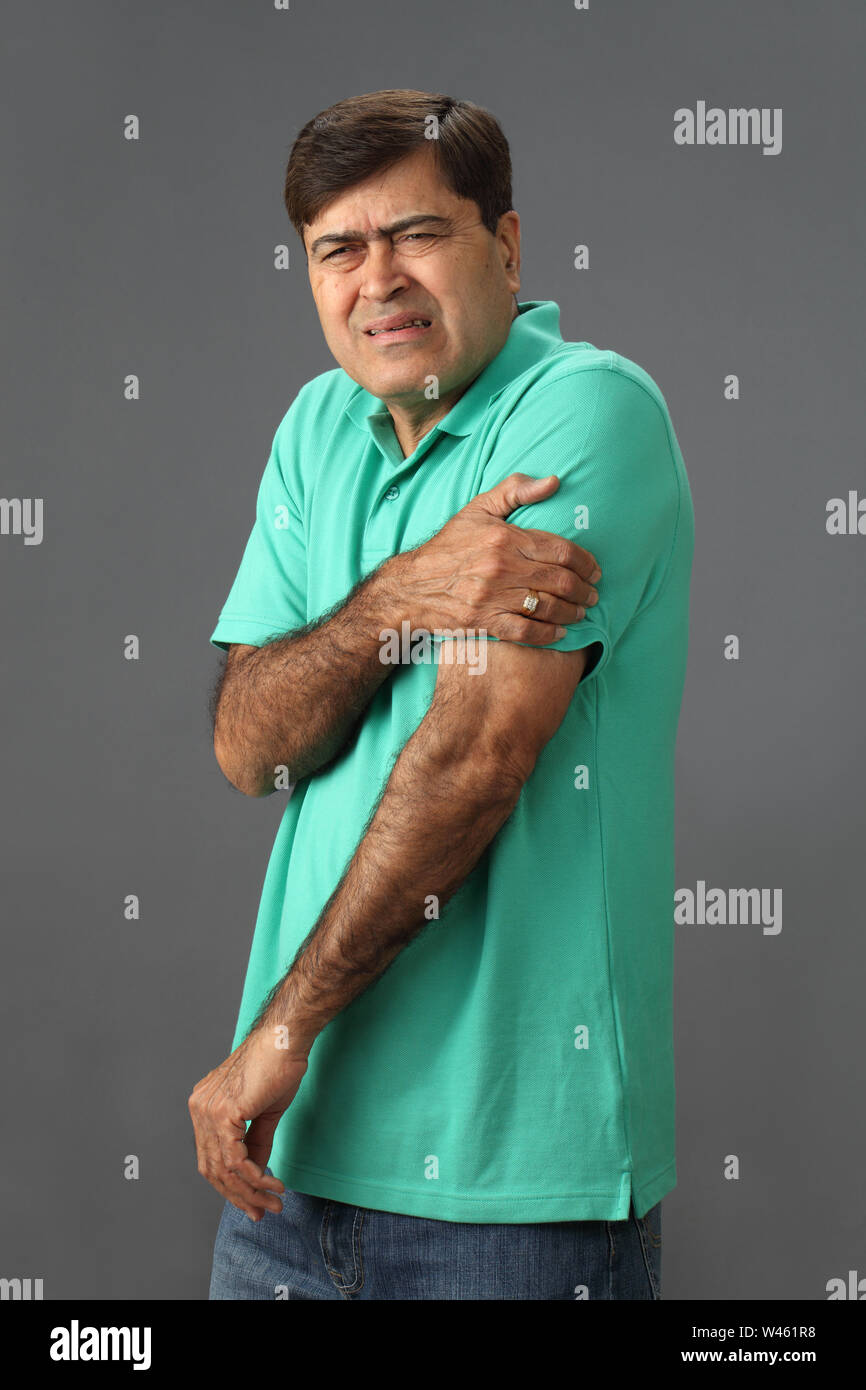 Man suffering from hand pain Stock Photo - Alamy