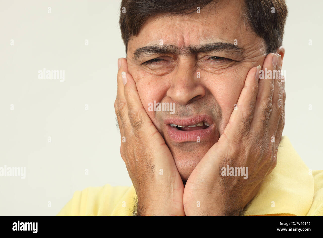 Man suffering from toothache Stock Photo - Alamy