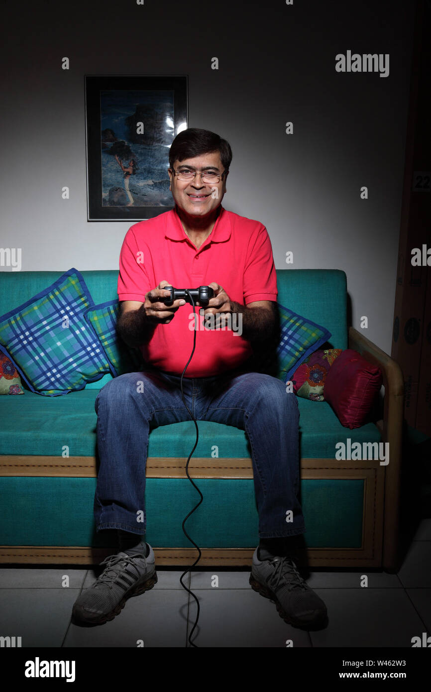 Grown men playing games hi-res stock photography and images - Alamy