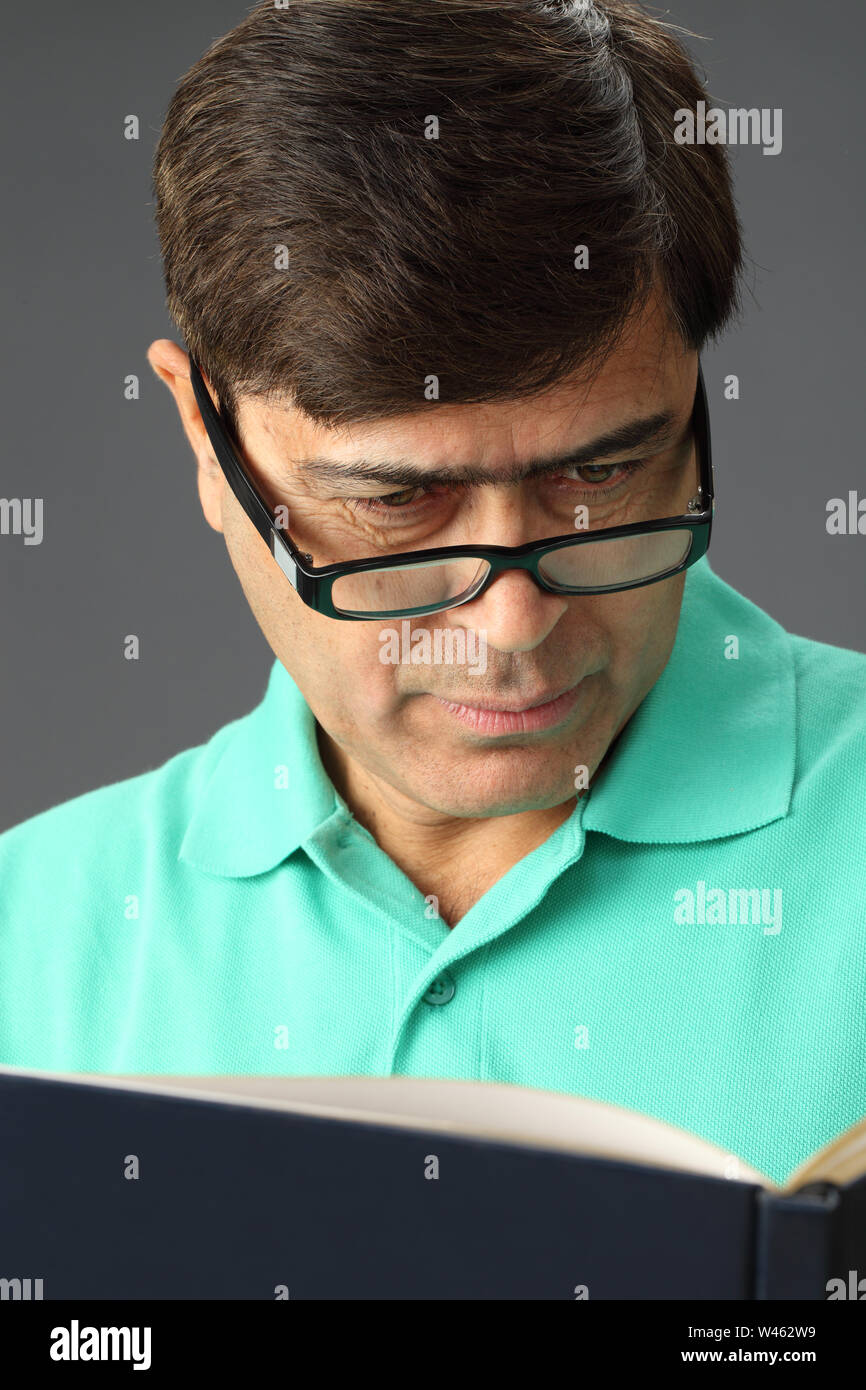 Man working on a personal organizer Stock Photo - Alamy