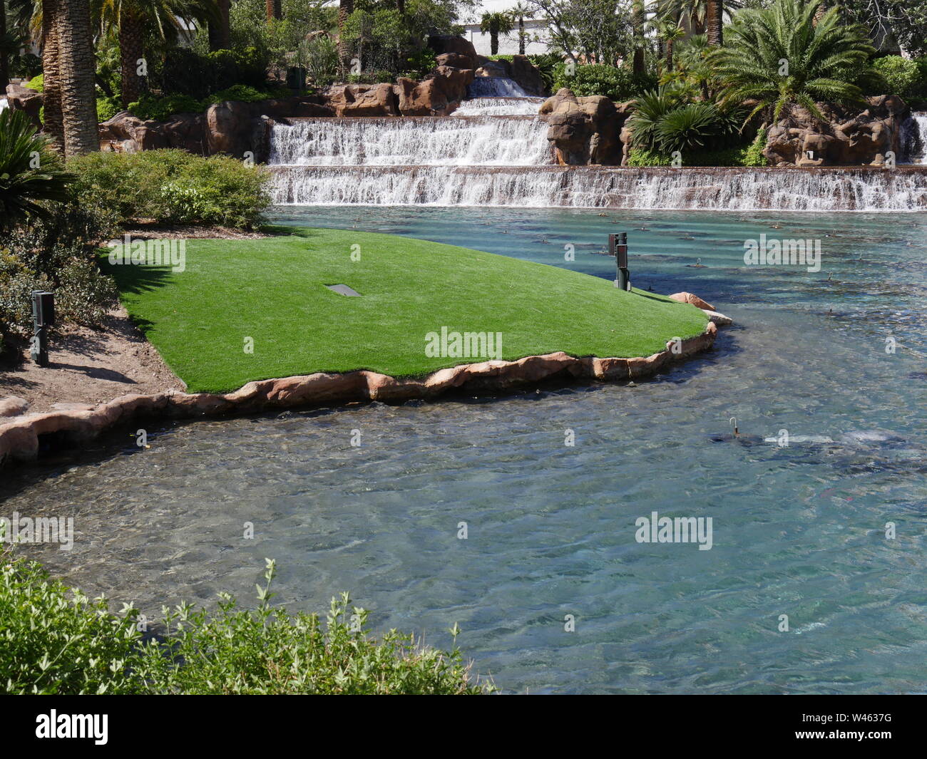 Wide view of a landscaped garden with waterfalls Stock Photo - Alamy