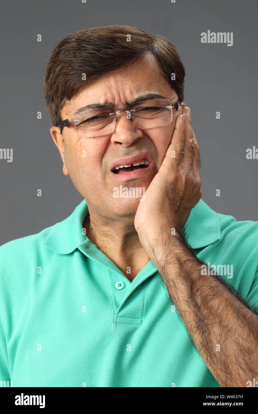 Man suffering from toothache Stock Photo - Alamy