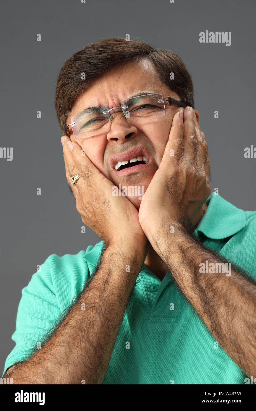 Man suffering from toothache Stock Photo - Alamy