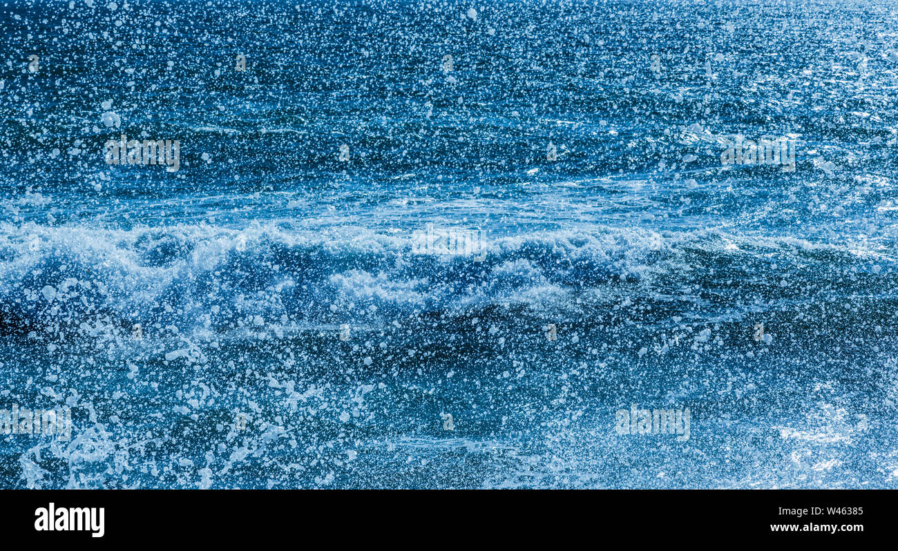 Waves and sea spray Stock Photo - Alamy