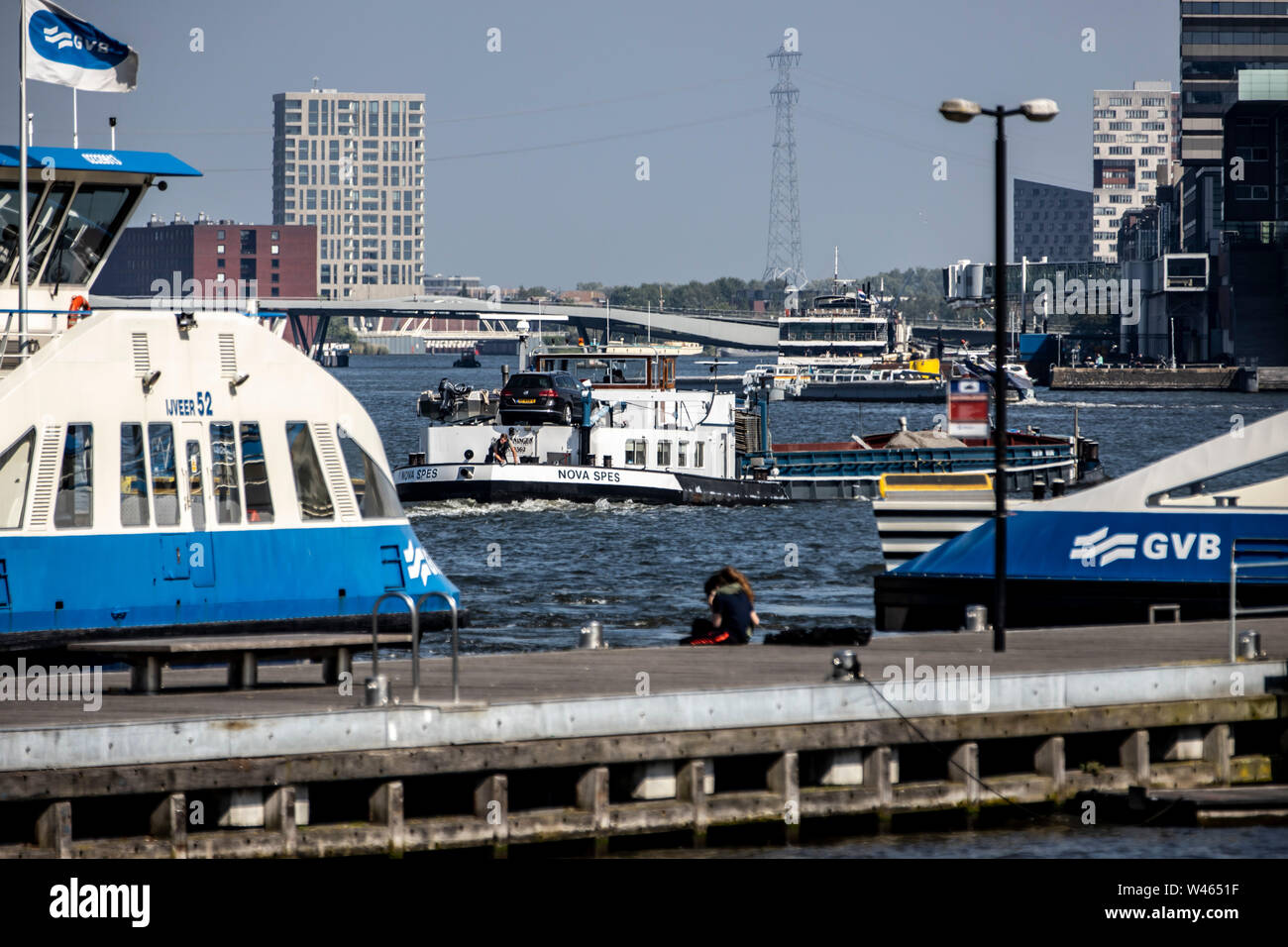 Amsterdam, Netherlands, passenger and bicycle ferry across the river Ij ...