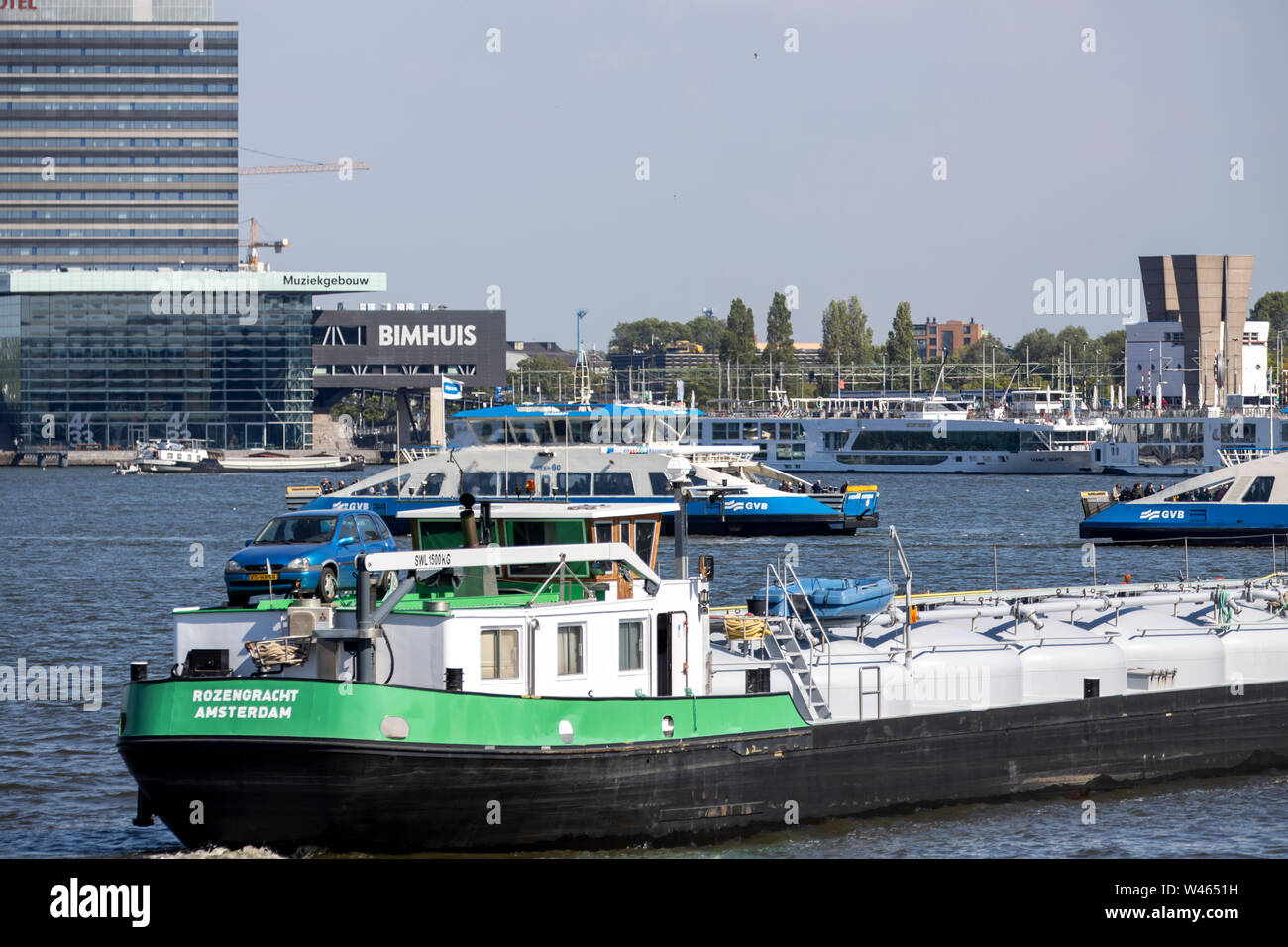 Amsterdam, Netherlands, passenger and bicycle ferry across the river Ij ...