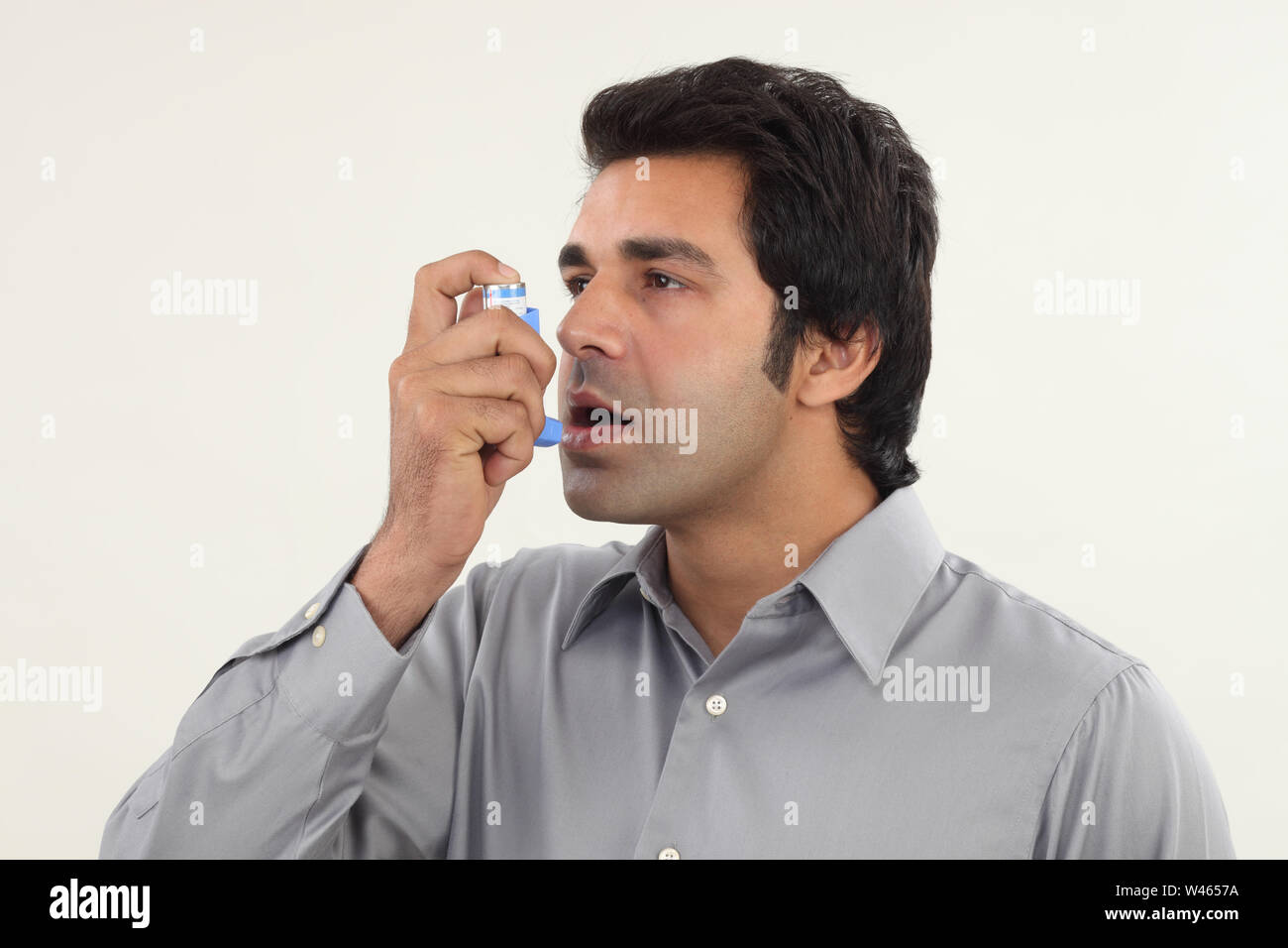Indian using inhaler hi-res stock photography and images - Alamy