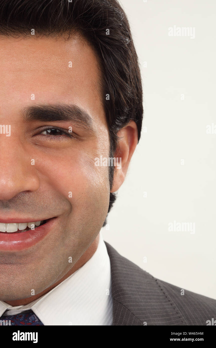 Portrait of a businessman smiling Stock Photo - Alamy