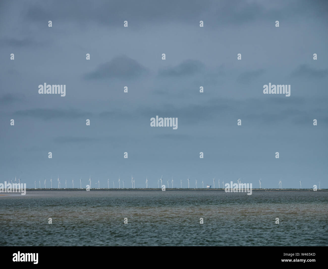 Wind turbines in the North Sea seen from Blaavand Beach, Denmark Stock ...