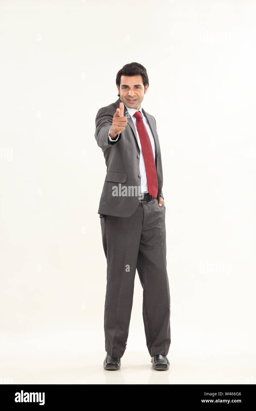 Portrait of a man pointing toward camera Stock Photo - Alamy