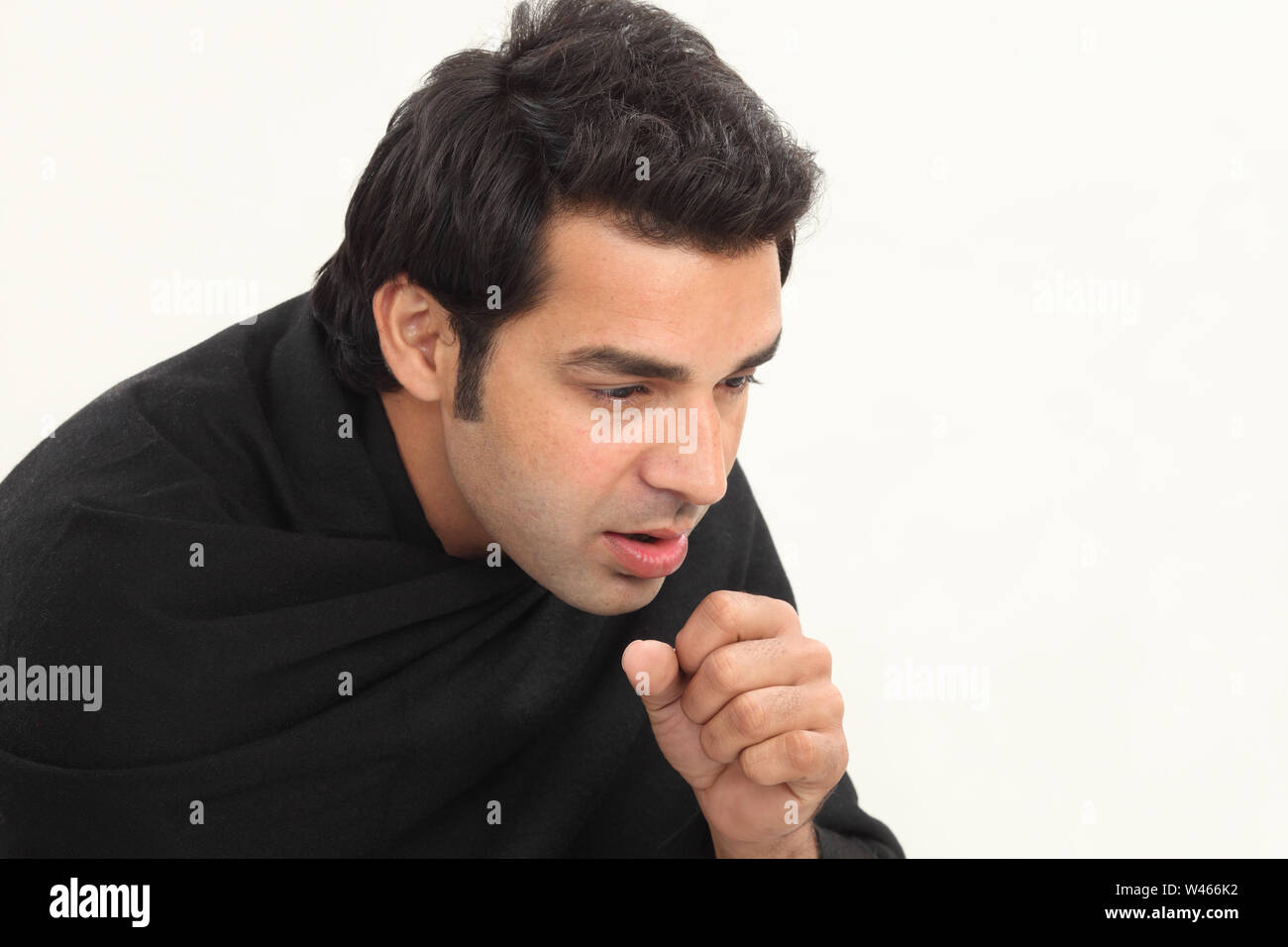 Close up of a man coughing Stock Photo - Alamy