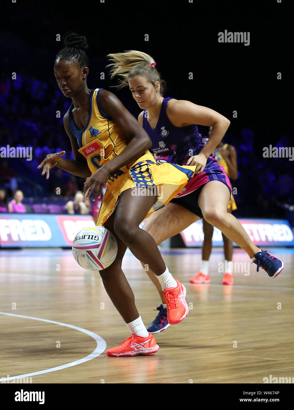 Barbados' Amanda Knight (left) and Scotland's Kelly Boyle battle for ...