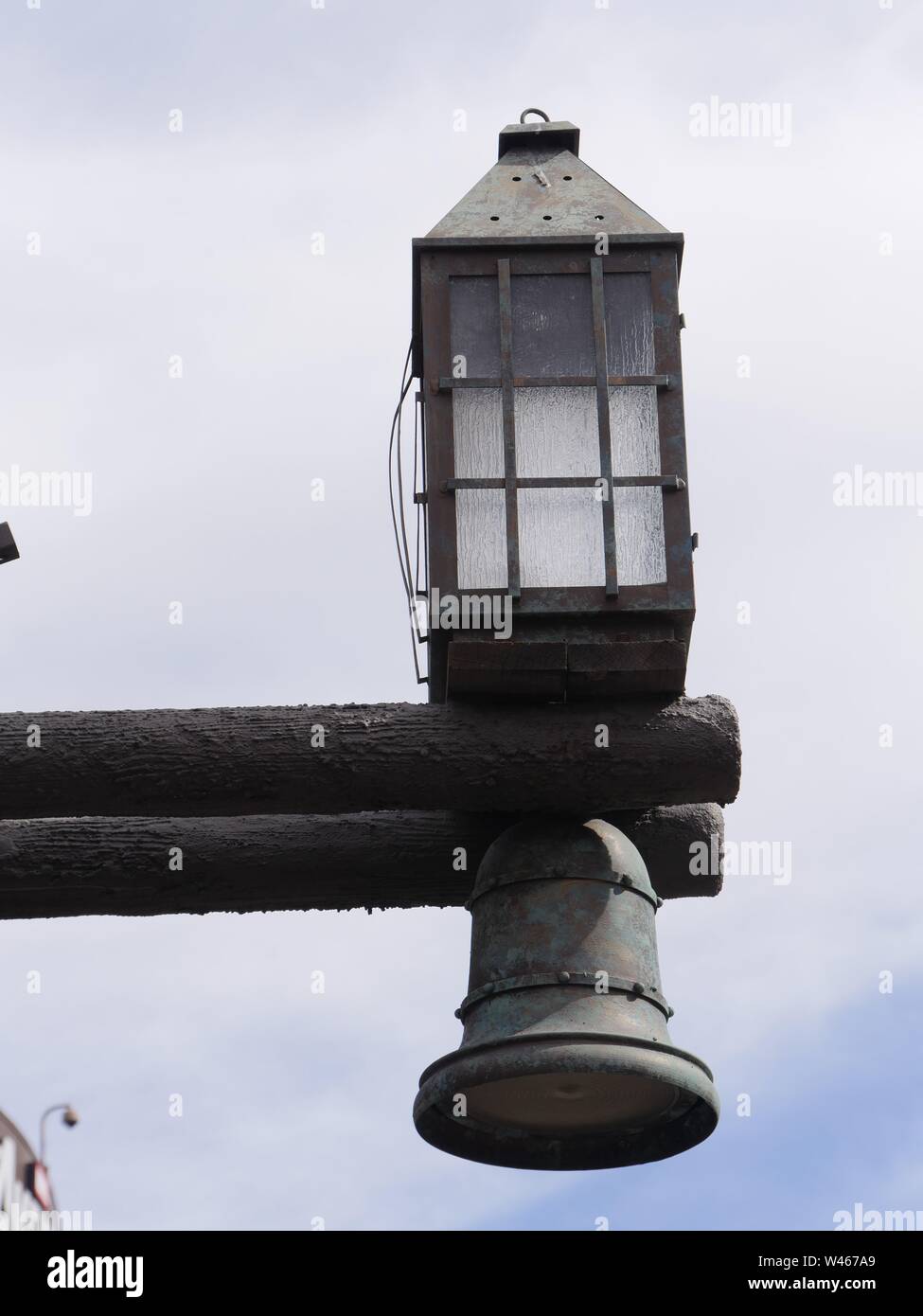 Upward shot of an antique lamp light, not lighted Stock Photo - Alamy