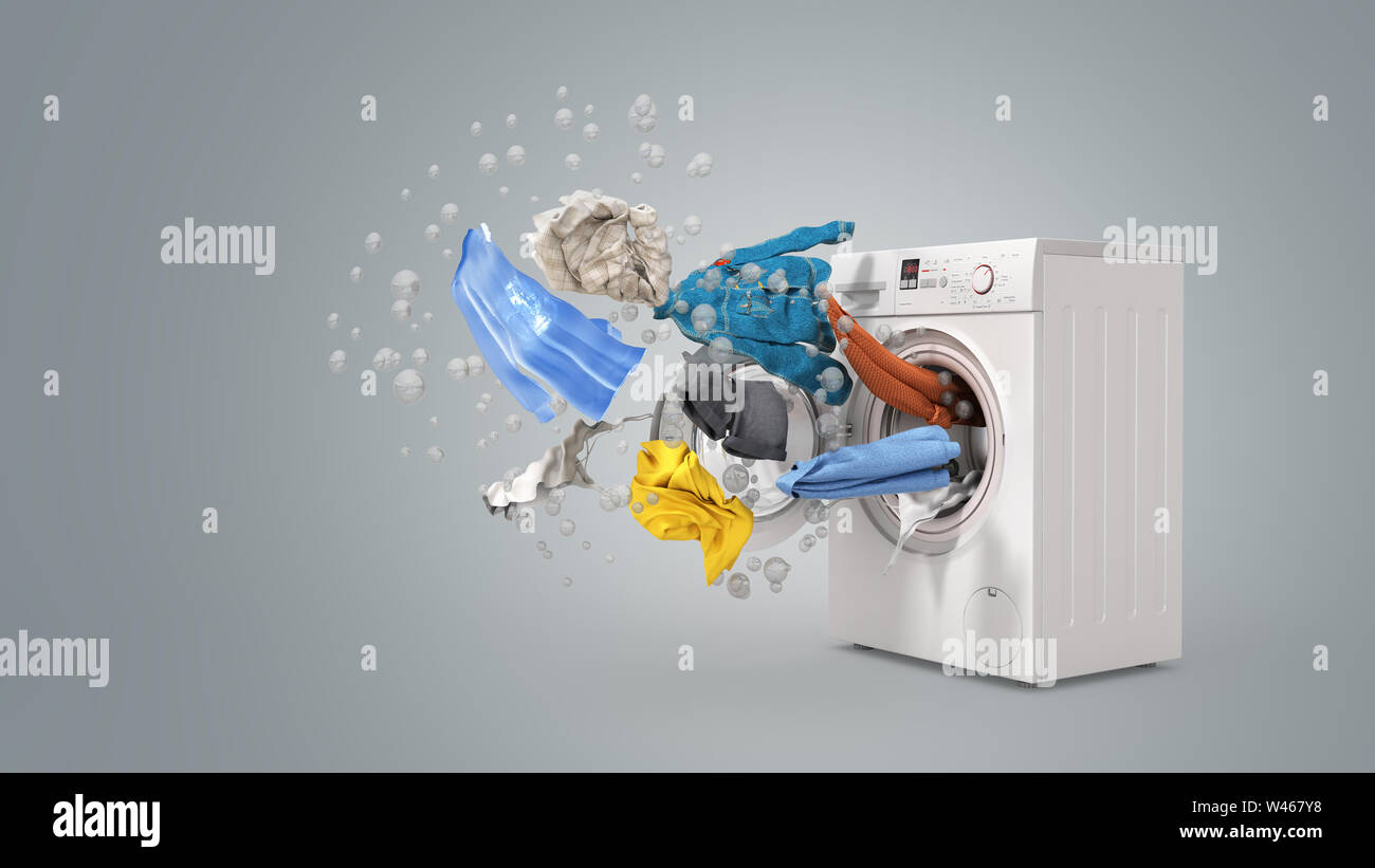 Washing machine and flying clothes on grey background Stock Photo - Alamy