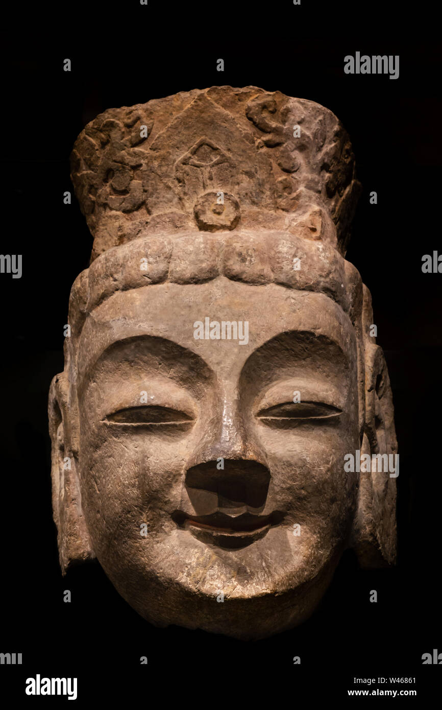6th Century ancient head of Bodhisattva limestone at Binyang dong caves ...