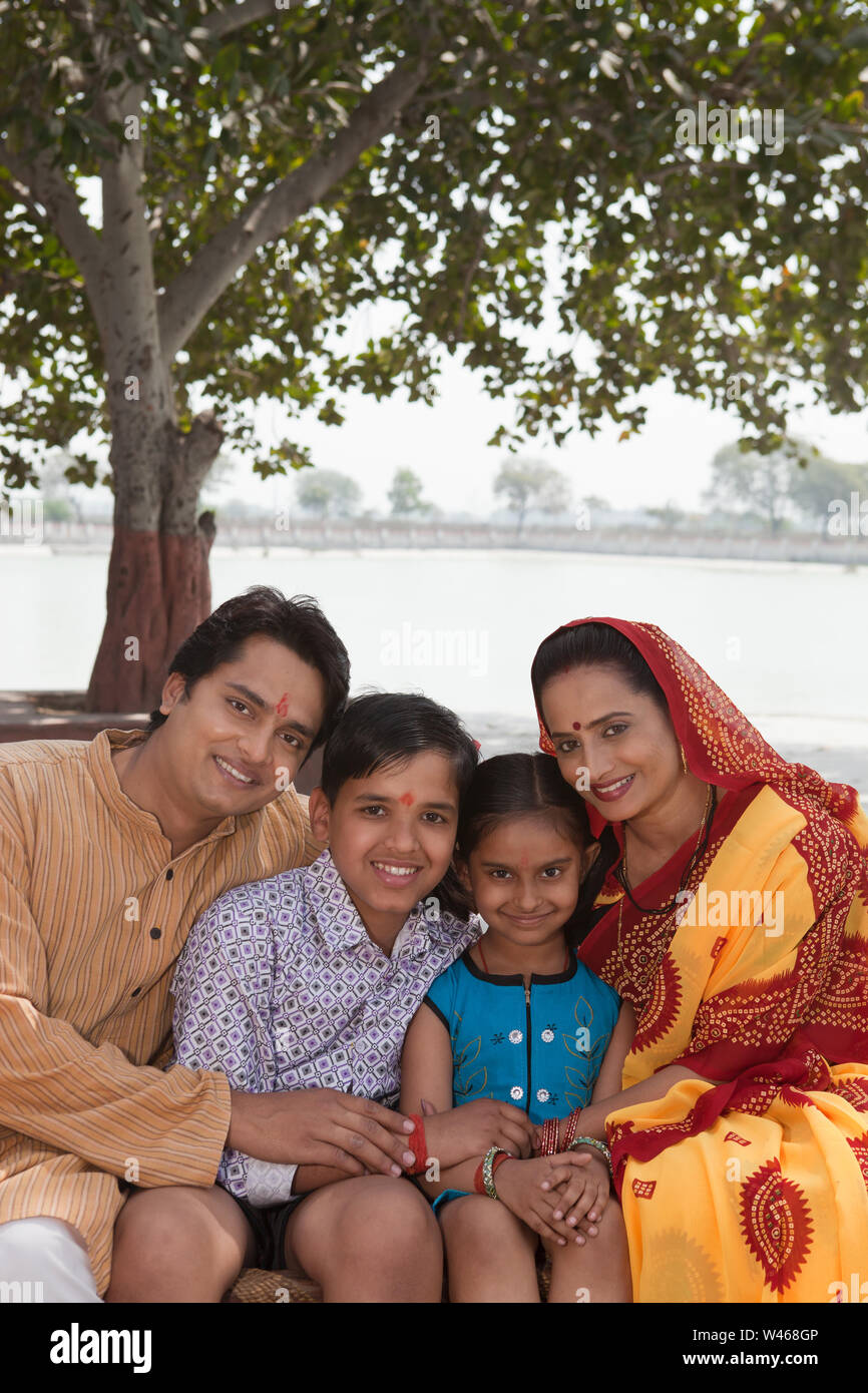 Portrait of rural family smiling Stock Photo - Alamy