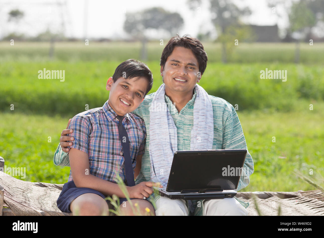 Portrait schoolboy using laptop hi-res stock photography and images - Alamy