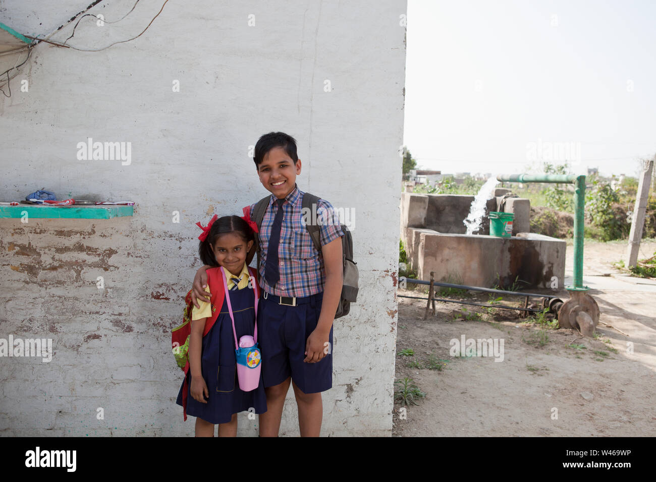 Portrait of two school children smiling Stock Photo - Alamy