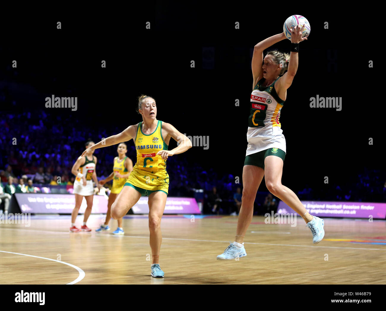Australia's Paige Hadley (left) and South Africa's Erin Burger battle ...