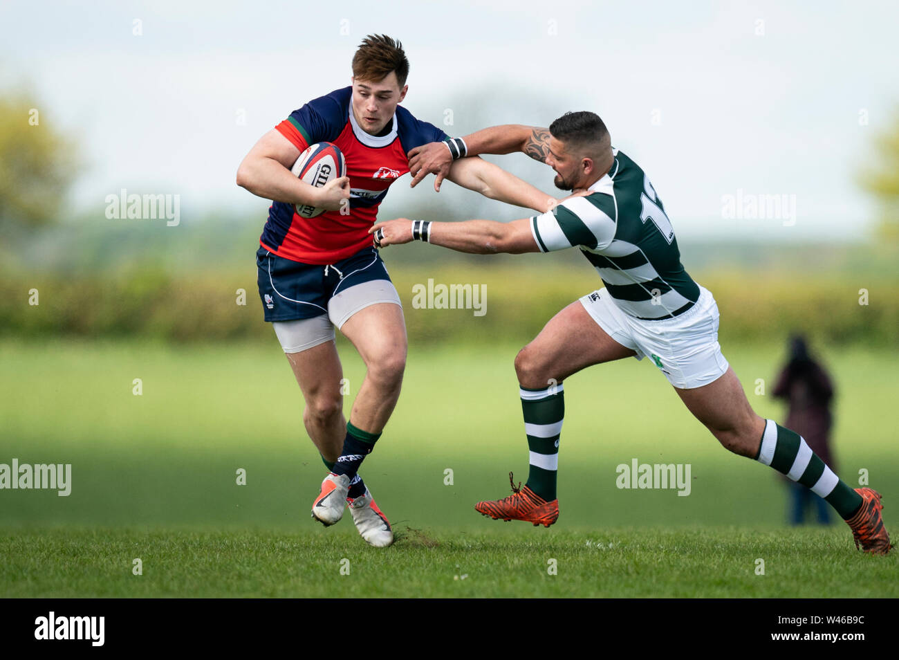 Rugby players in action Stock Photo - Alamy