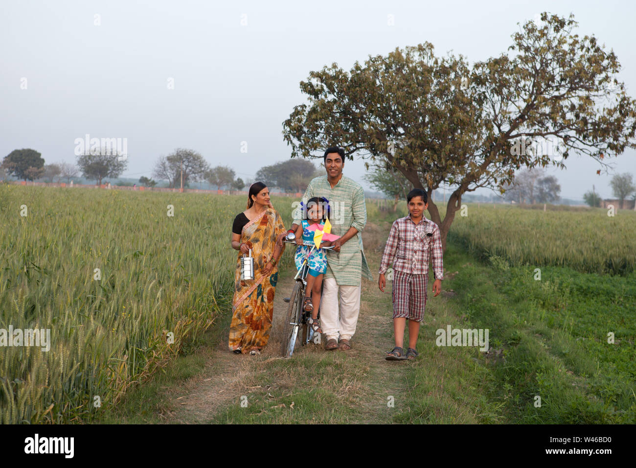 Indian rural family cycle hi-res stock photography and images - Alamy
