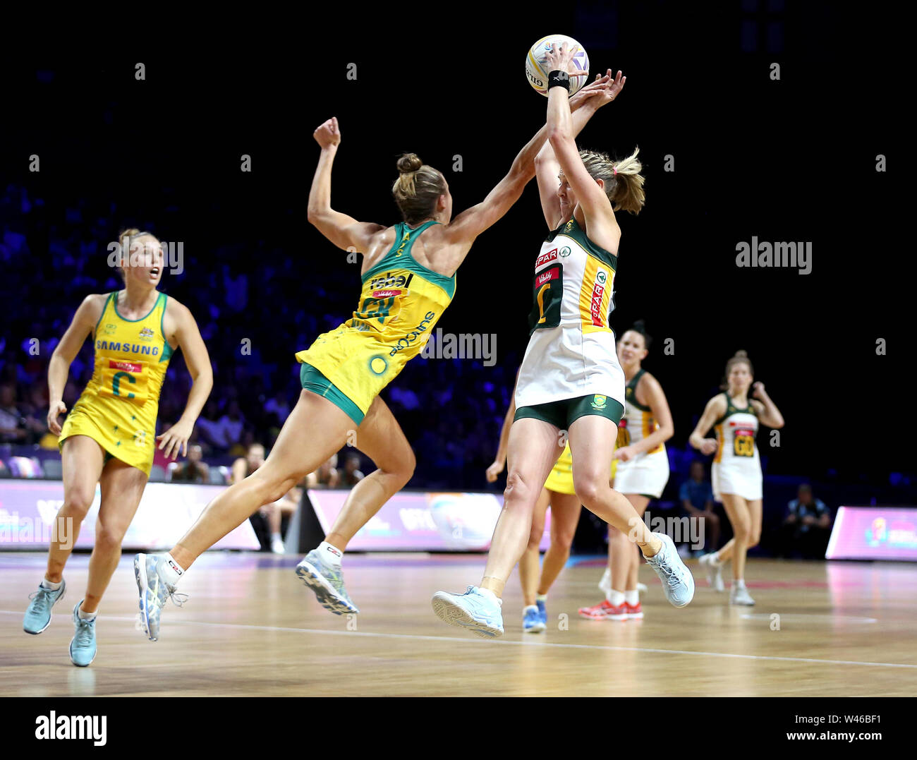 Australia's Sarah Klau (left) and South Africa's Erin Burger battle for ...