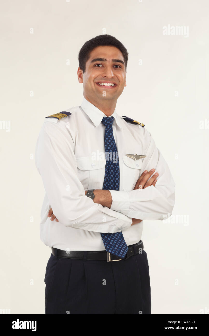 Portrait of a pilot smiling Stock Photo - Alamy