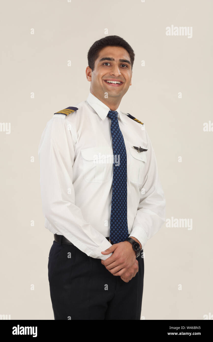 Portrait of a pilot smiling Stock Photo - Alamy