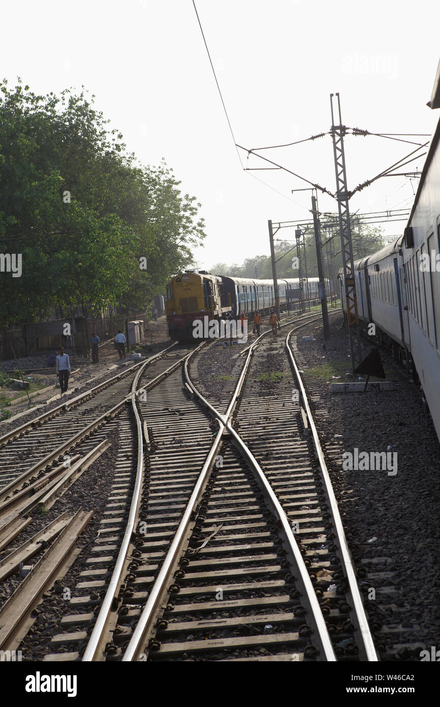 Train on a railroad track Stock Photo - Alamy