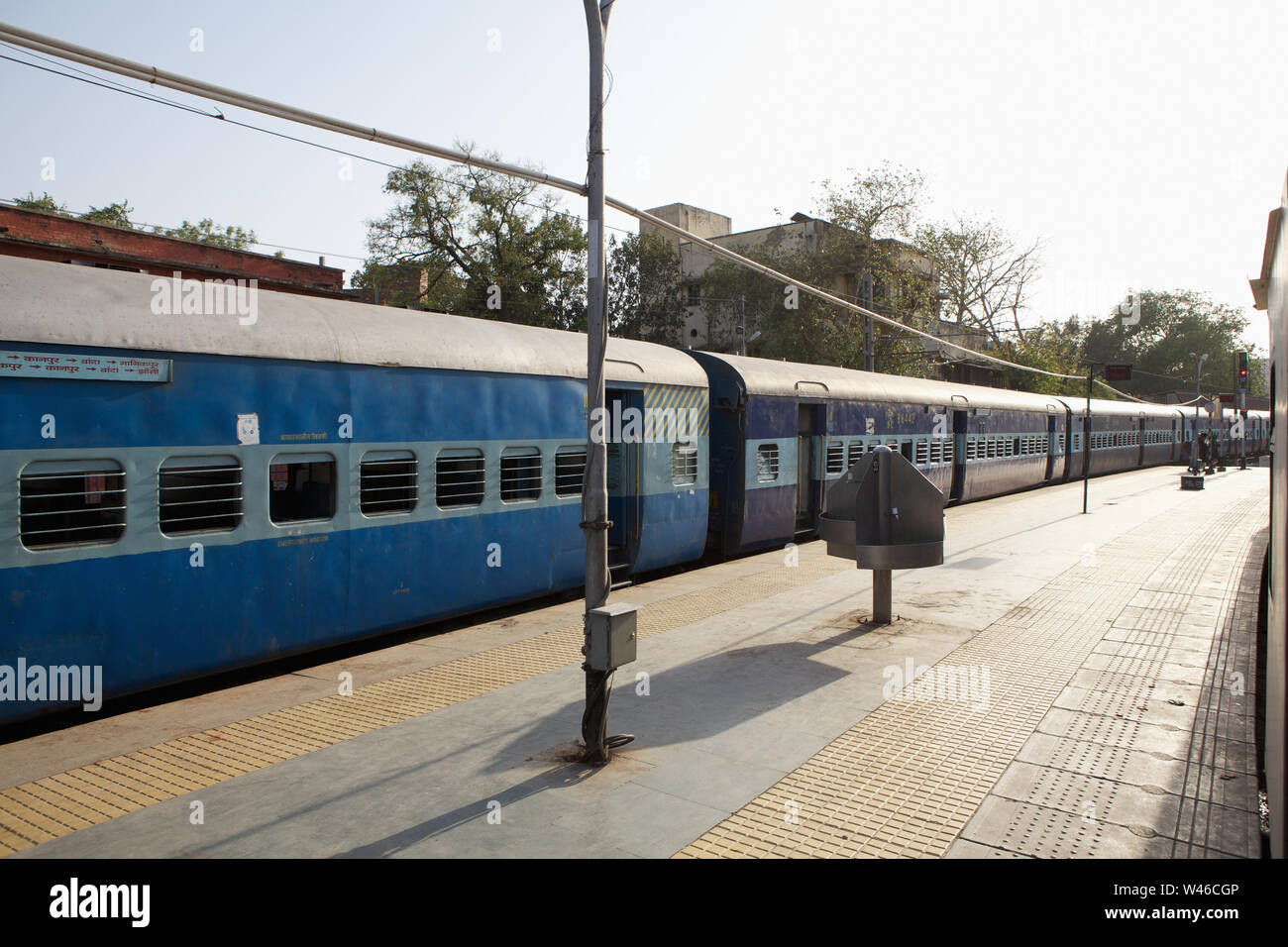 Train at a platform, India Stock Photo - Alamy