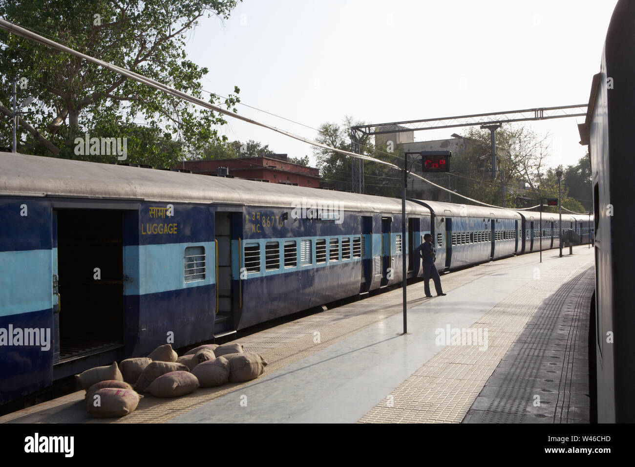 Train at a platform, India Stock Photo - Alamy