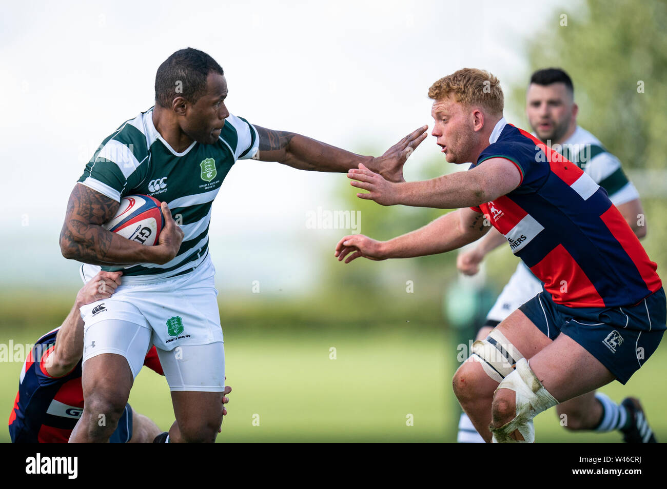 Rugby players in action Stock Photo - Alamy