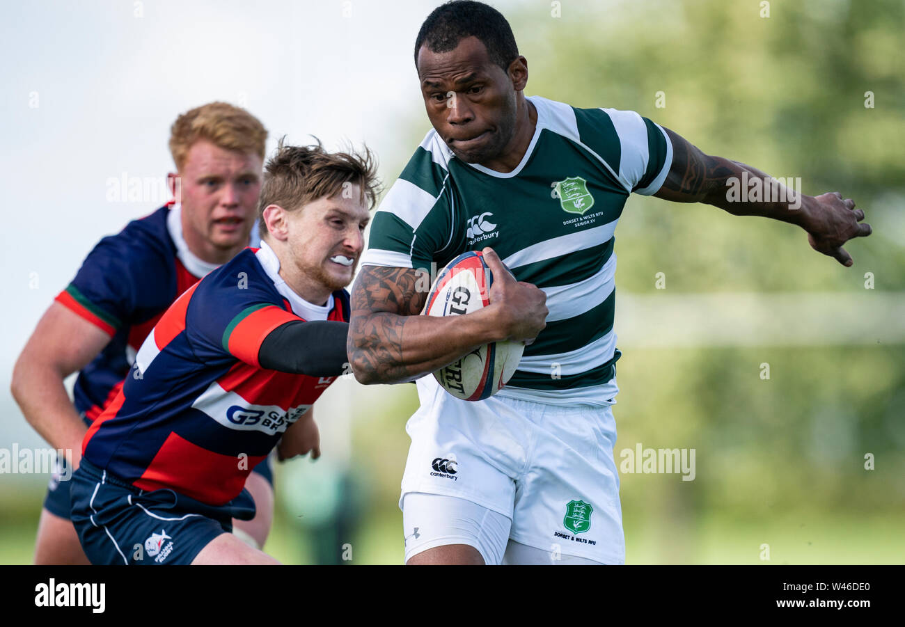 Rugby players in action Stock Photo - Alamy