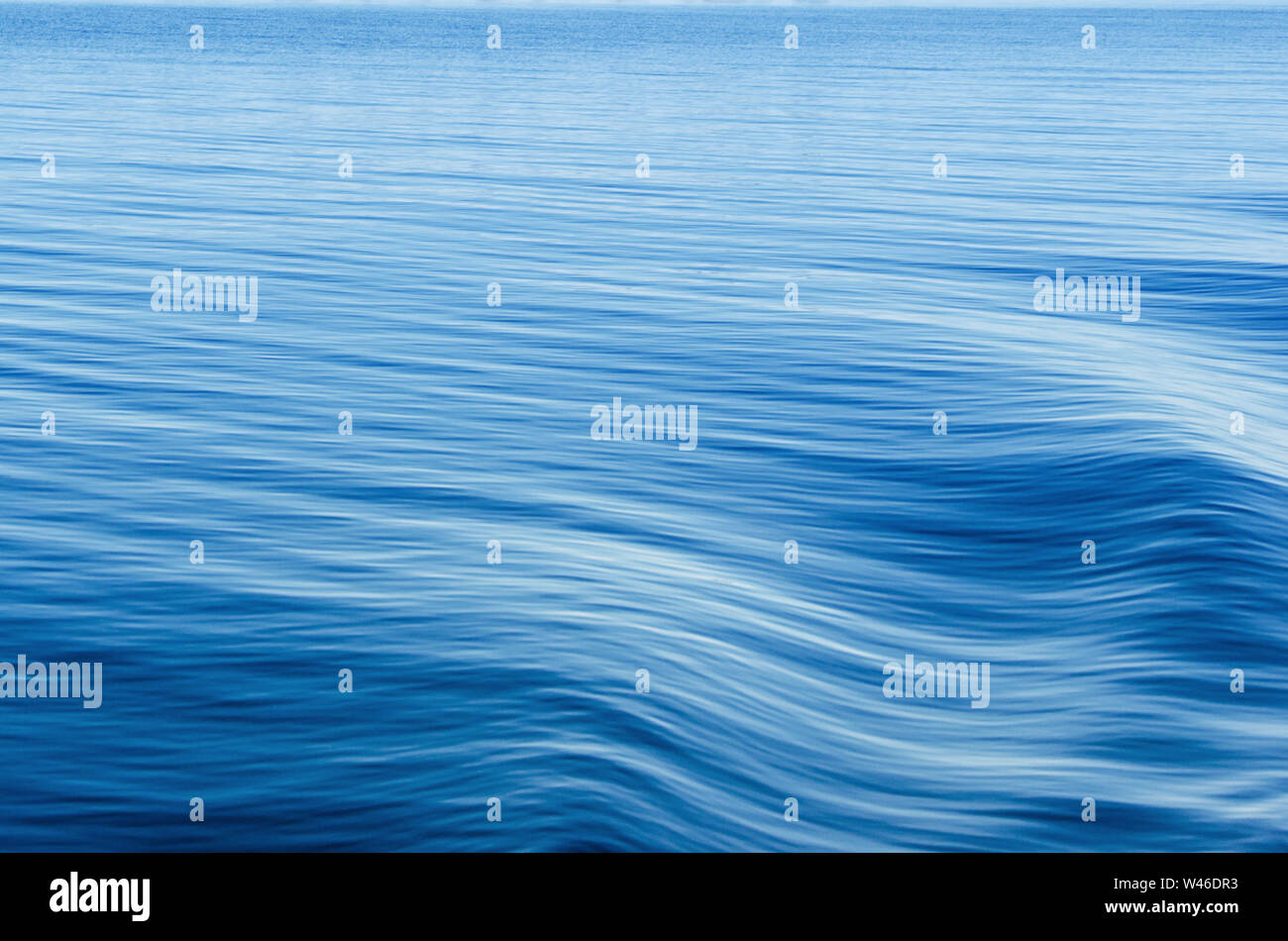 Waves on surface of water Stock Photo - Alamy