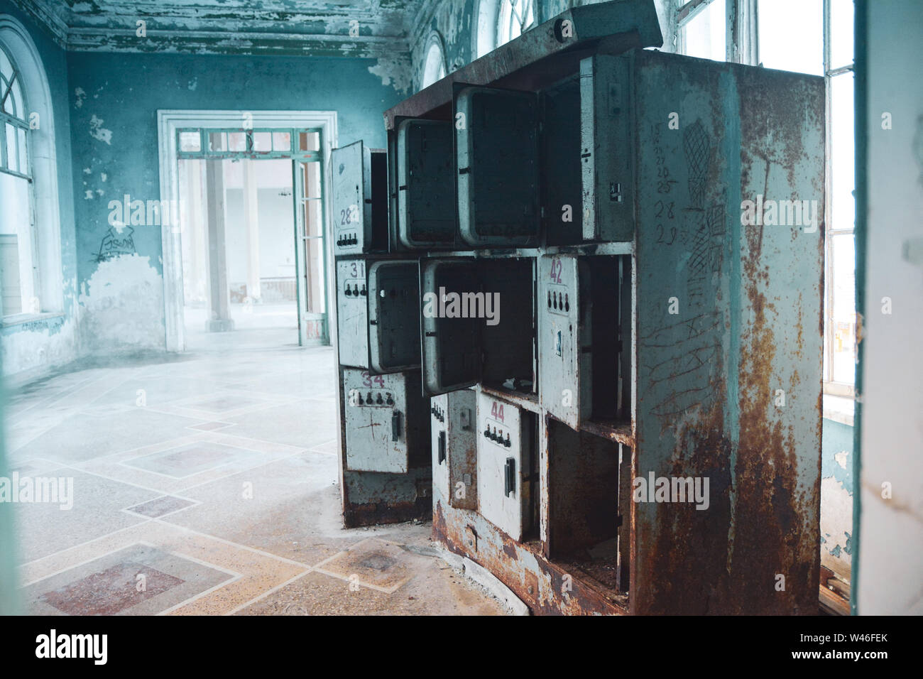 empty storage boxes in an abandoned building Stock Photo - Alamy
